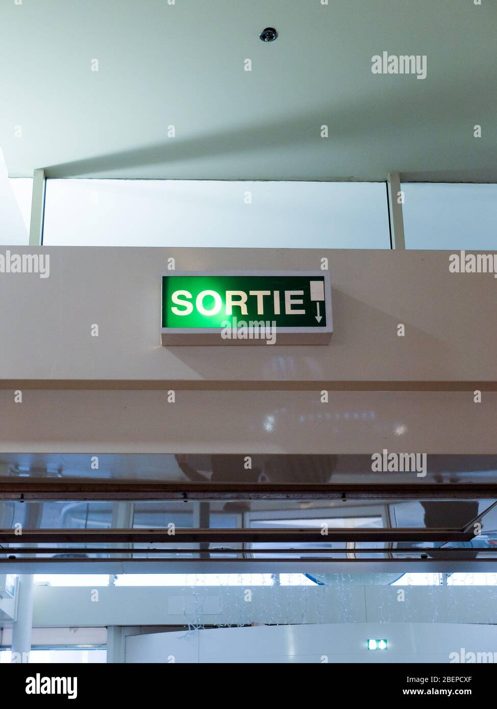 French exit «Sortie» light panel with direction indicator Stock Photo ...