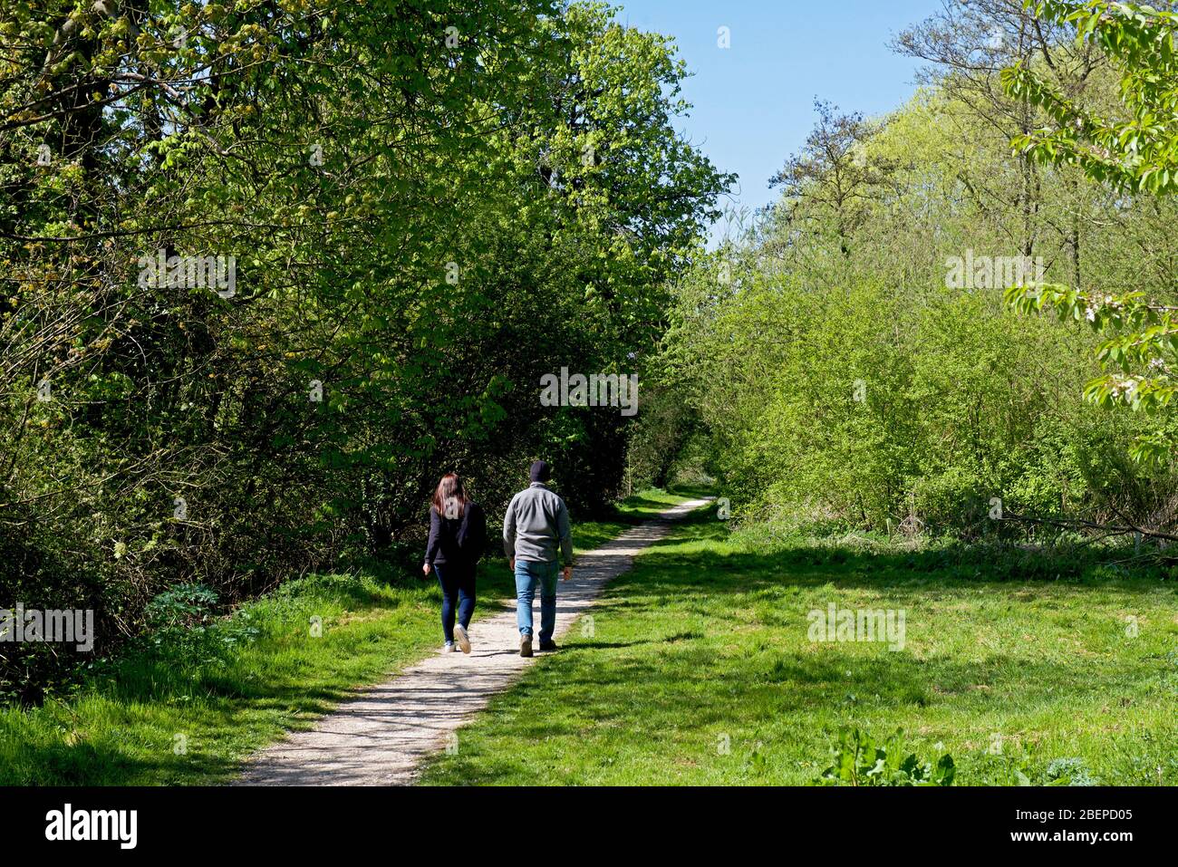 Couple on path at Howden Marsh, a local nature reserve in Howden, East ...