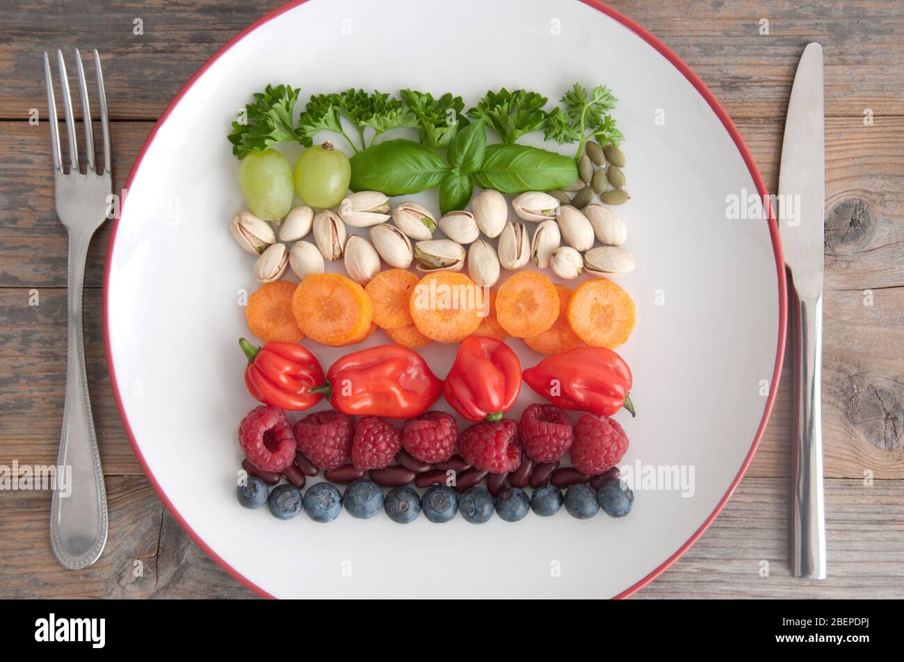 Colorful vegan plant based diet ingredients including grains; nuts ...