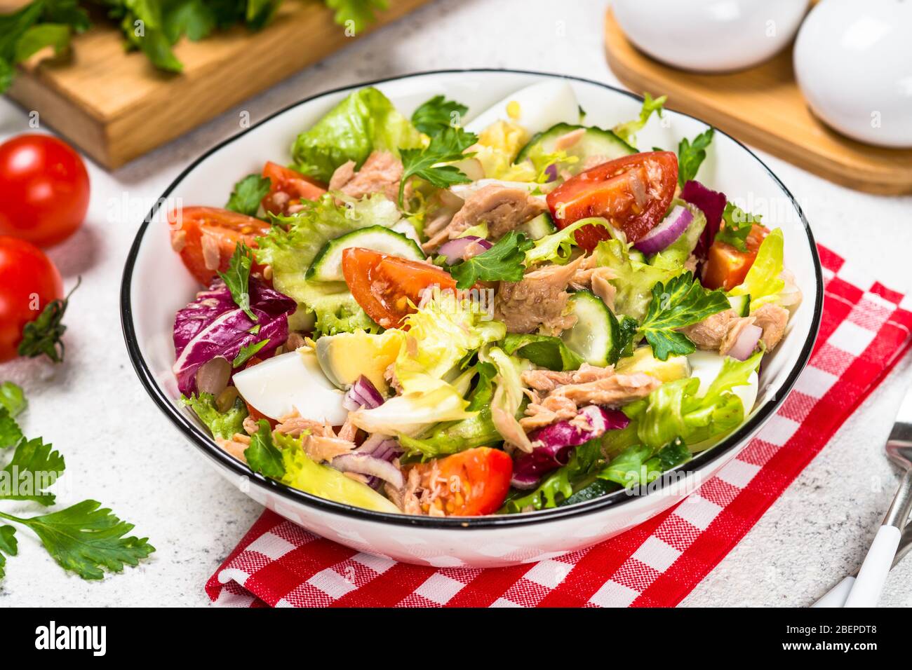 Tuna salad with green leaves, eggs and vegetables Stock Photo - Alamy