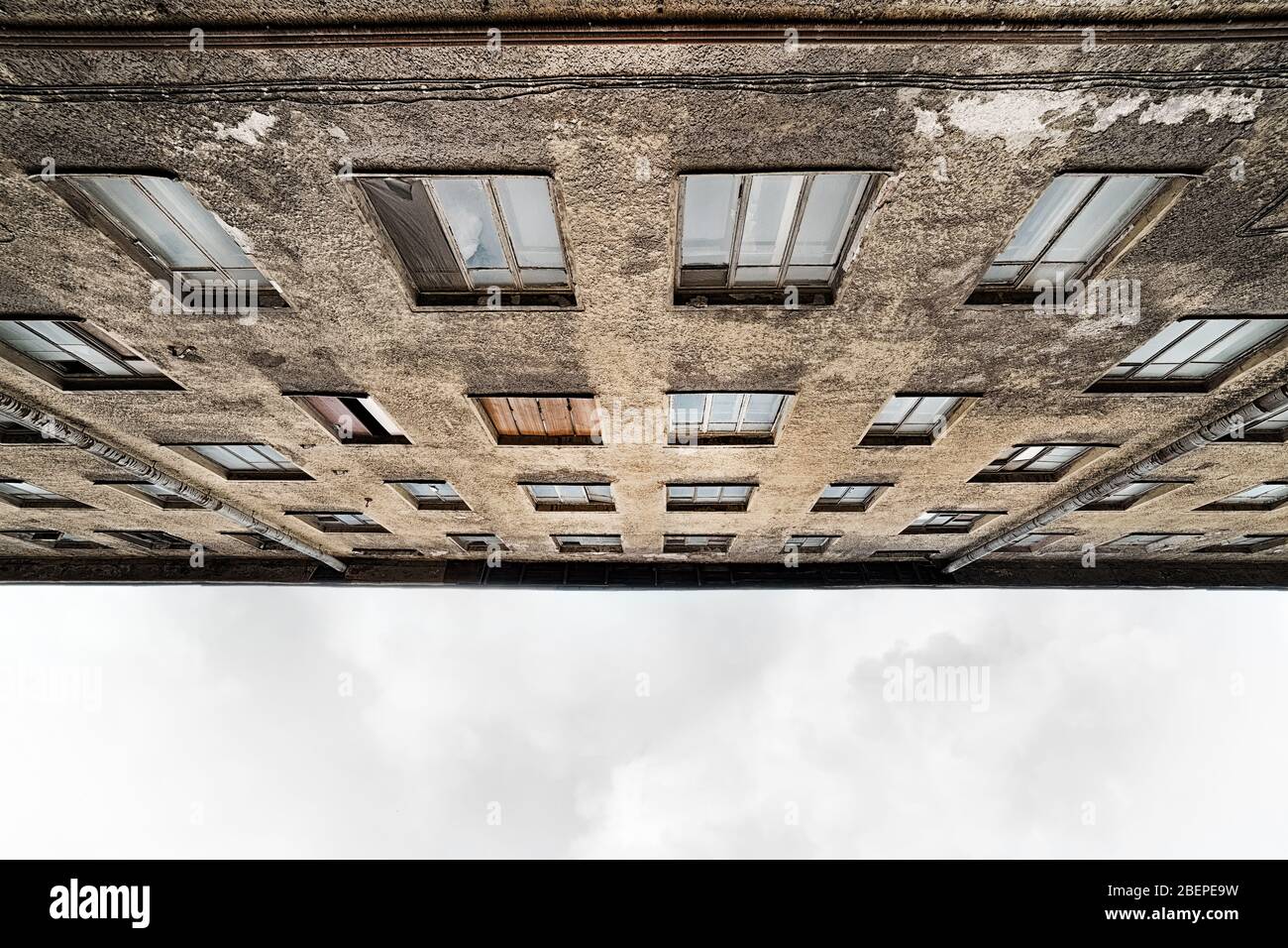 Old abandoned building low angle view. Deserted residential with ...