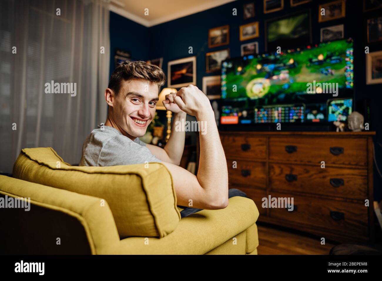 Young nerdy adolescent esport gamer playing and winning competitive ...