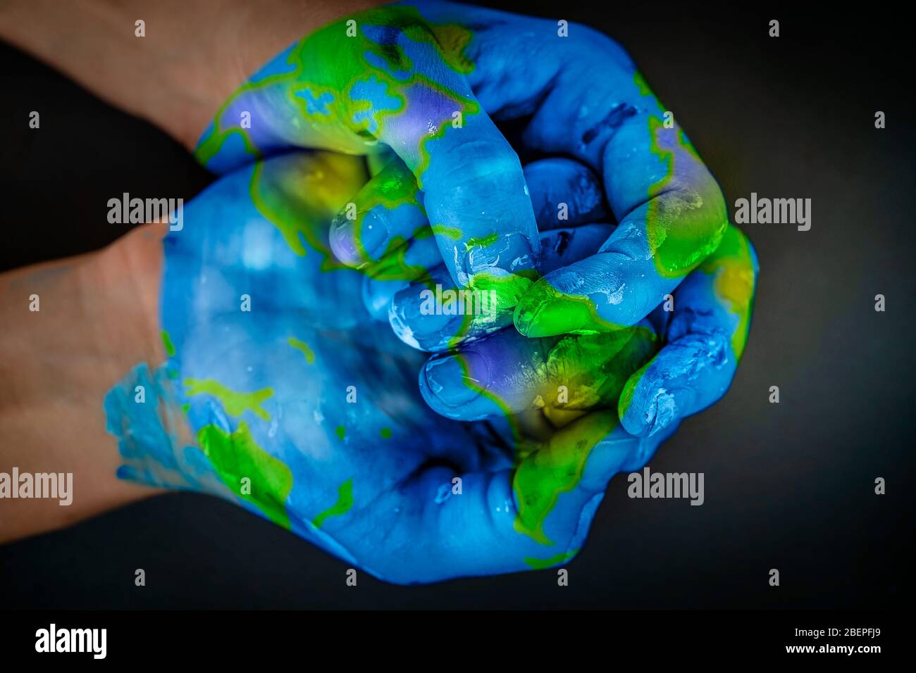 Safety of the planet earth in our hands, conceptual photo of an ...