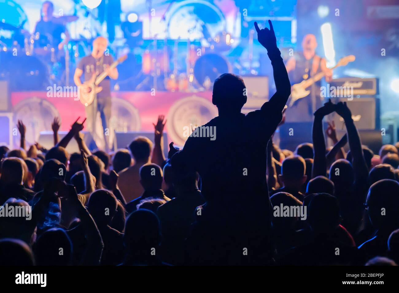 Fans at live rock music concert cheering Stock Photo - Alamy
