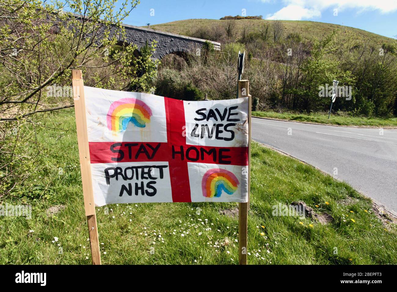 Covid 19 - homemade sign on road leading to popular Dorset beaches ...