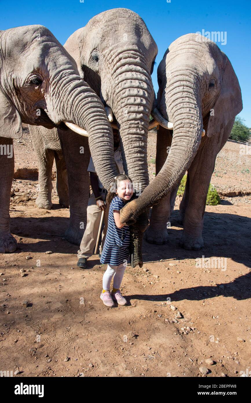 A brave young girl is thrilled to be alone with three friendly, giant ...