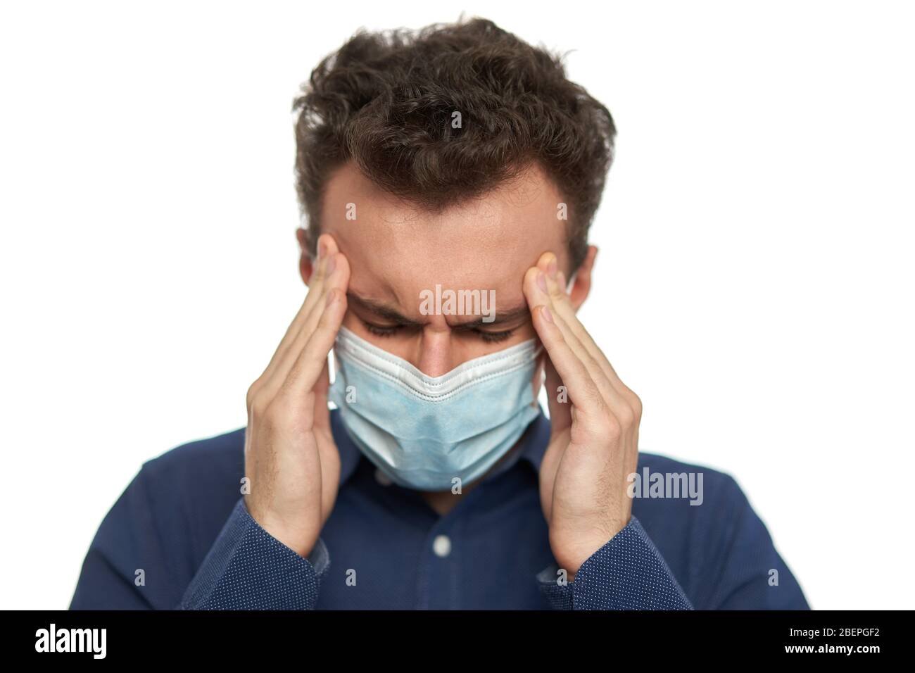Man with flu and severe migraine on white background Stock Photo - Alamy