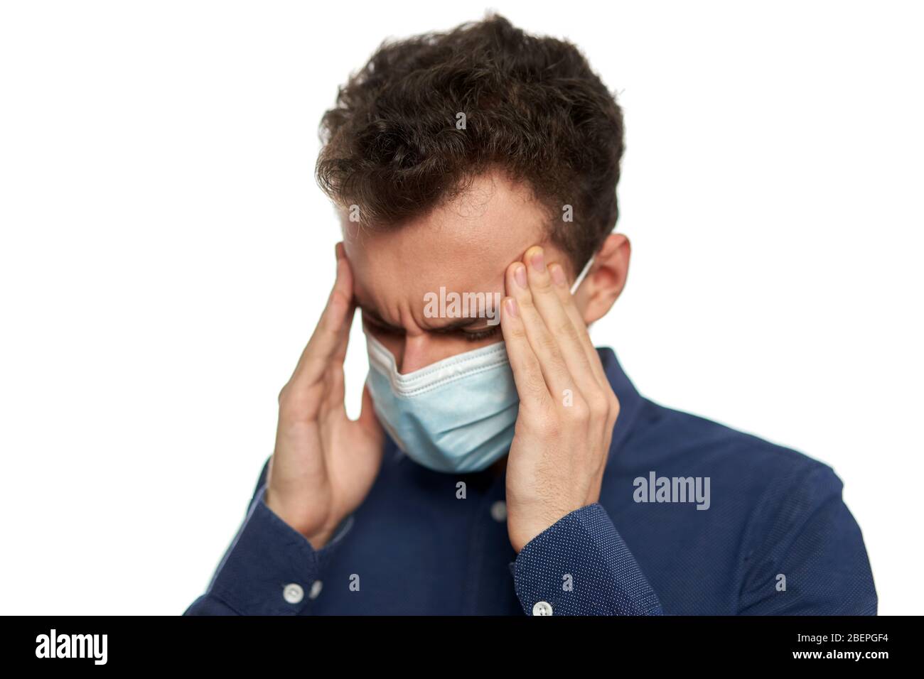 Man with flu and severe migraine on white background Stock Photo - Alamy