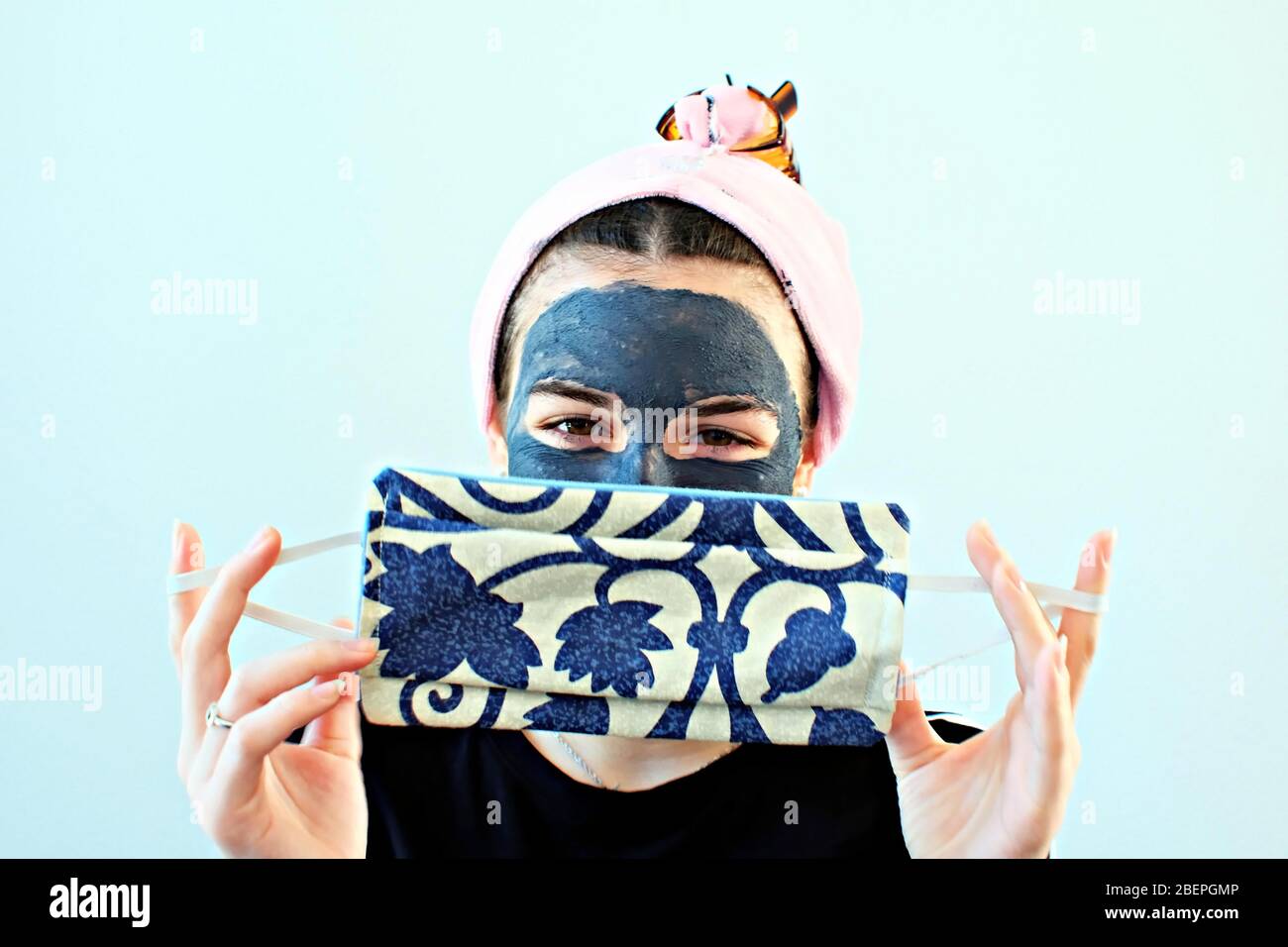 Woman eyes behind mask hi-res stock photography and images - Alamy