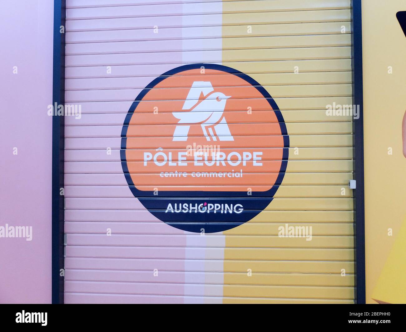 Interior of Auchan supermarket and Pôle Europe mall. Auchan is a French ...