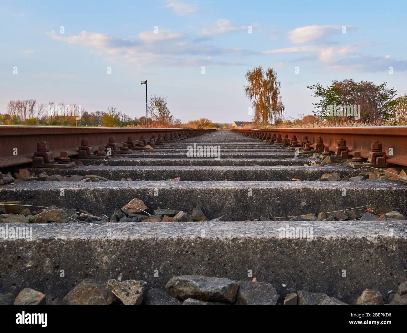 old rusty Railroad track in autumnal scene Stock Photo - Alamy