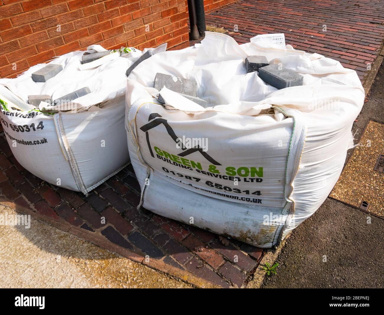 Two bags of building material pavior bricks for making a driveway Stock ...