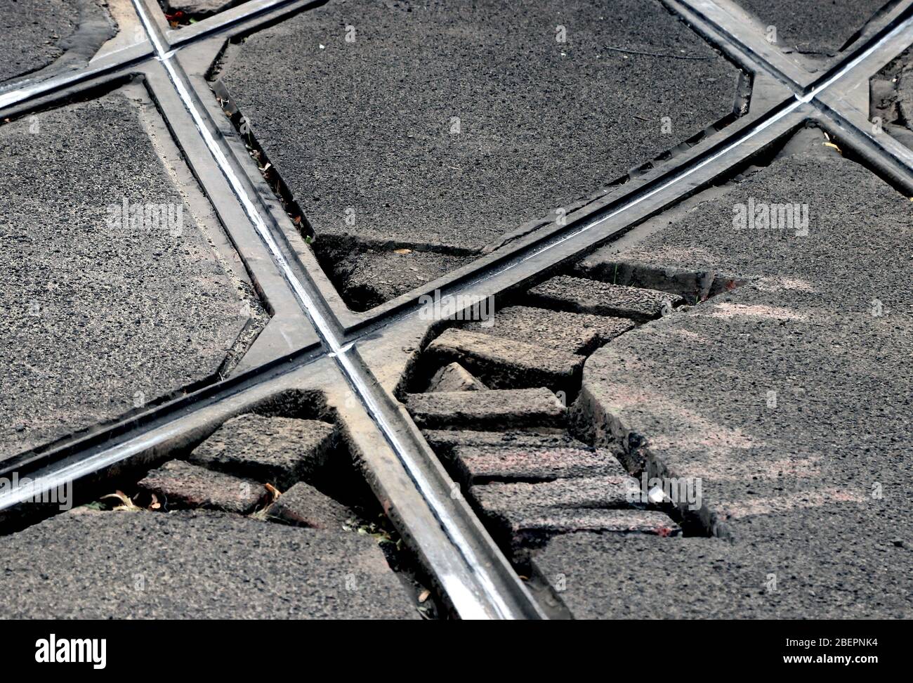 On a busy intersection in Berlin, the track bed of the tram of the ...