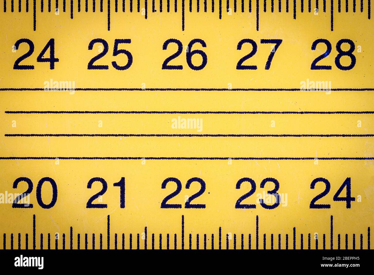Yellow metal ruler close up with millimeters and centimeters Stock ...