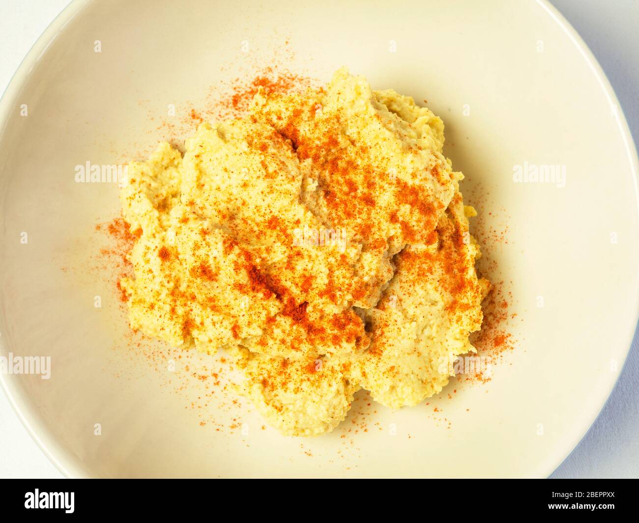 Freshly made bowl of hummus made from chick peas tahini olive oil lemon ...
