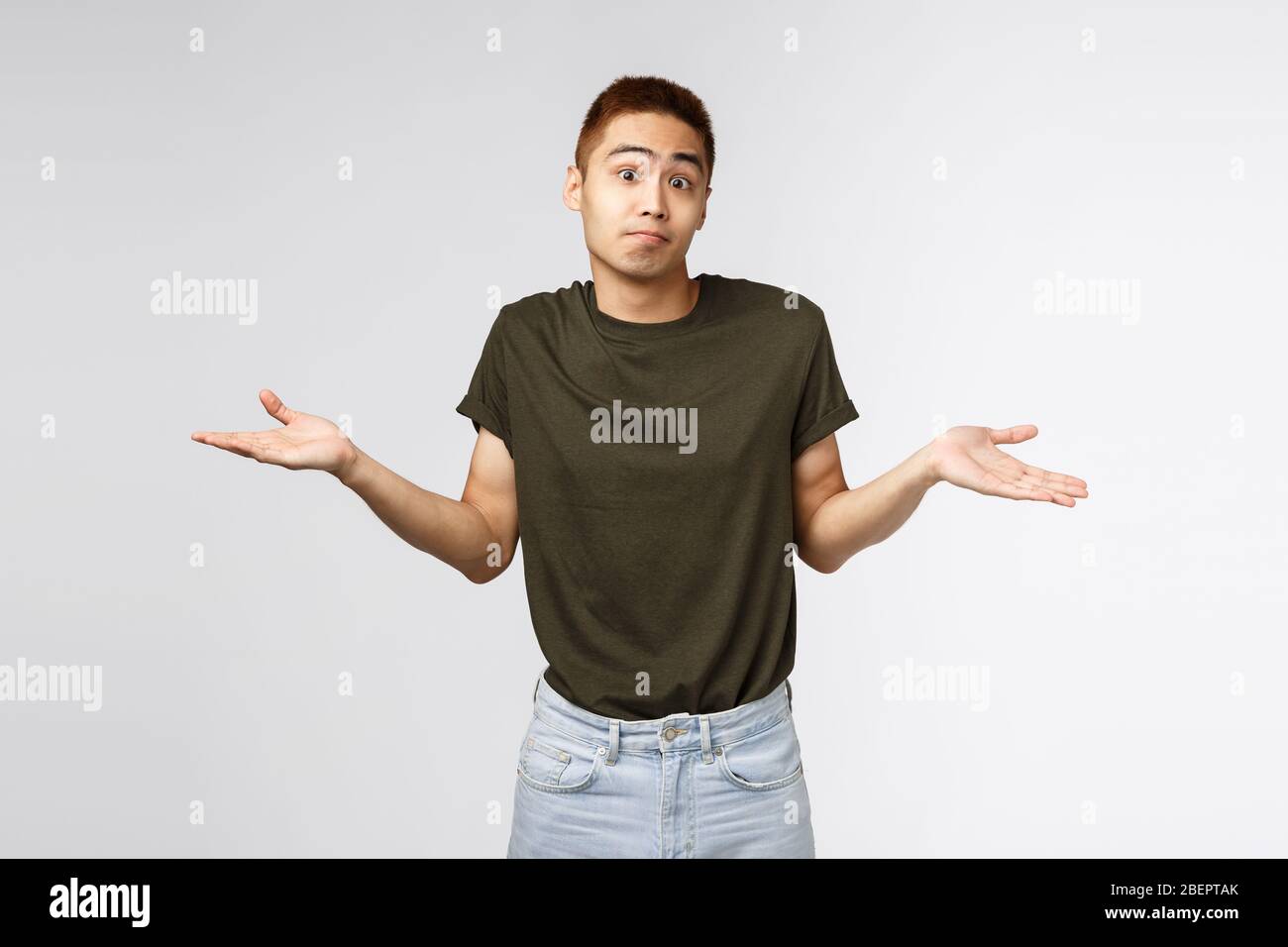 Who knows, I dont aware. Portrait of confused shrugging asian man in ...