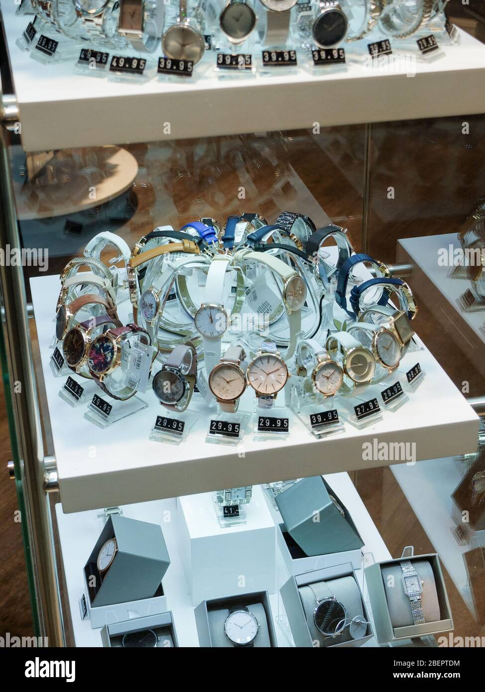 Jewelry display stand with pretty watches for girls Stock Photo - Alamy