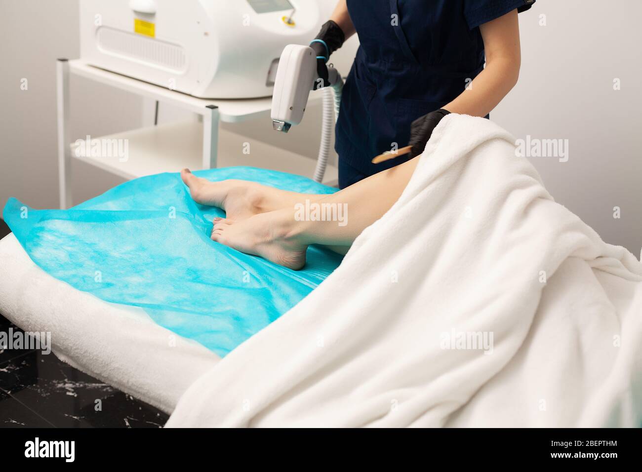 Woman getting soft laser treatment hi-res stock photography and images ...