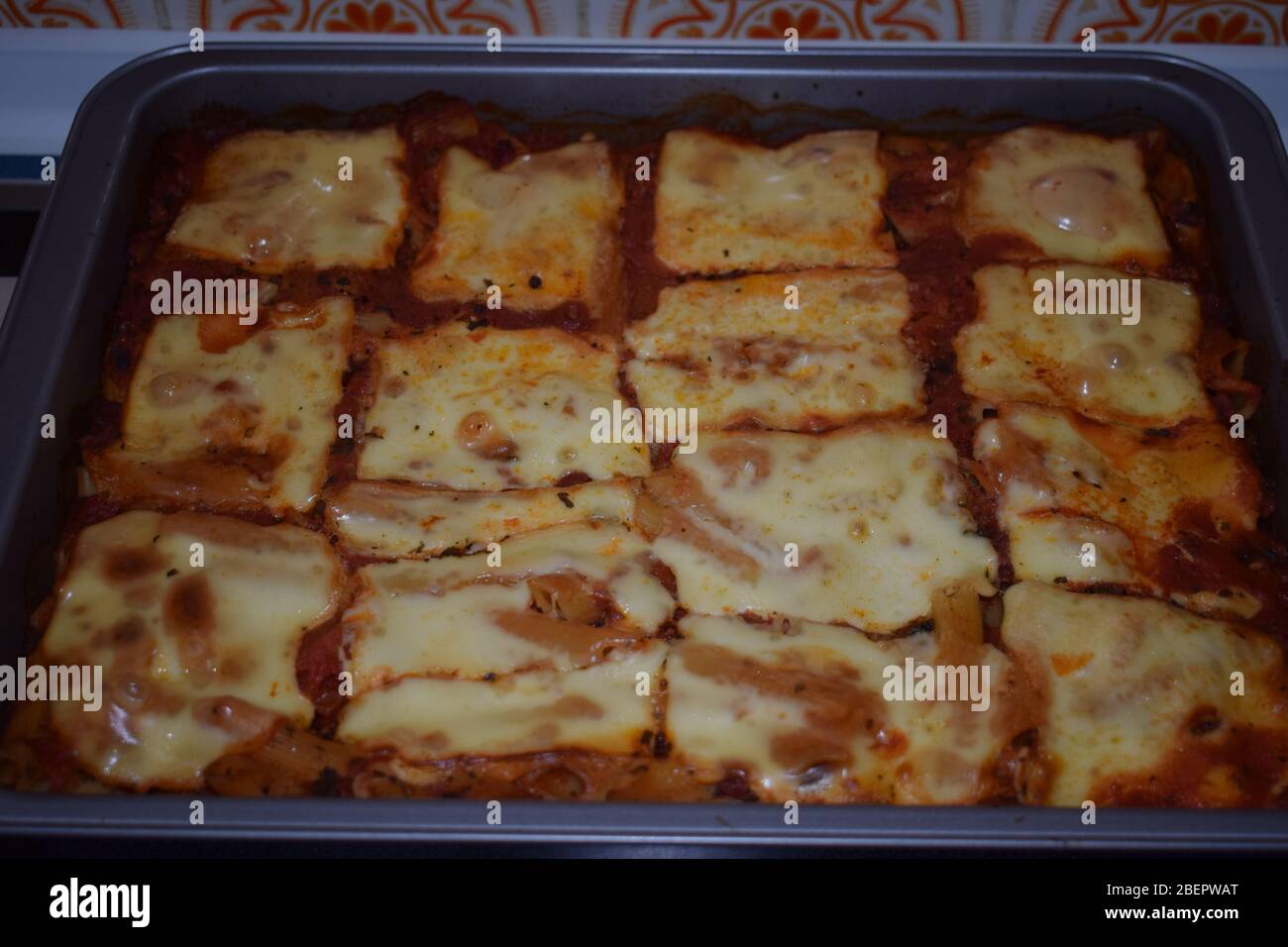 baked cheese topping Stock Photo - Alamy