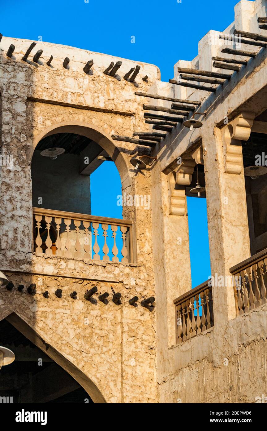 Old buildings in the Souq Waqif area of Doha. Shows wooden beams and ...