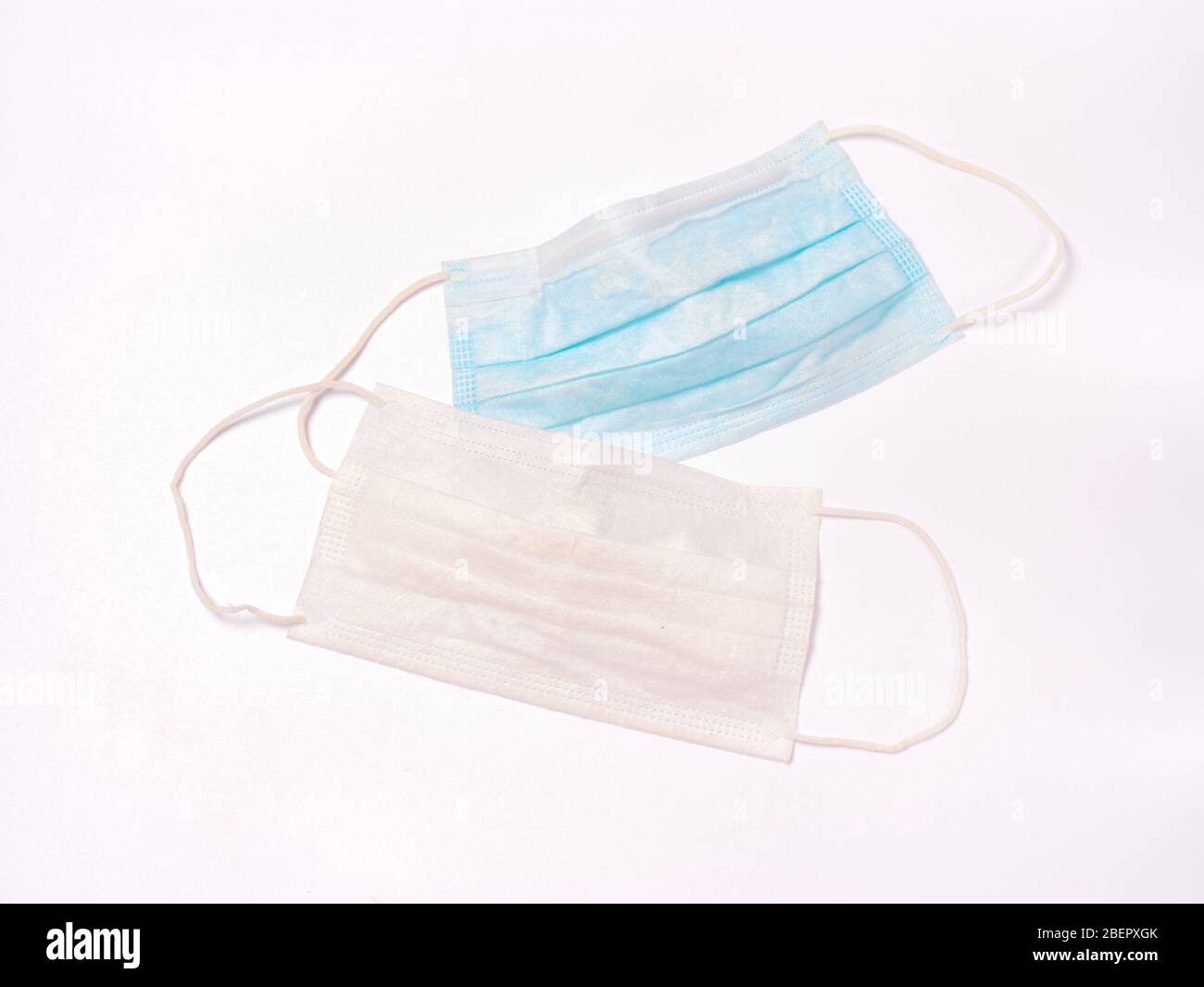 Two Used Medcine Face masks on black background. Mask to prevent Covid ...