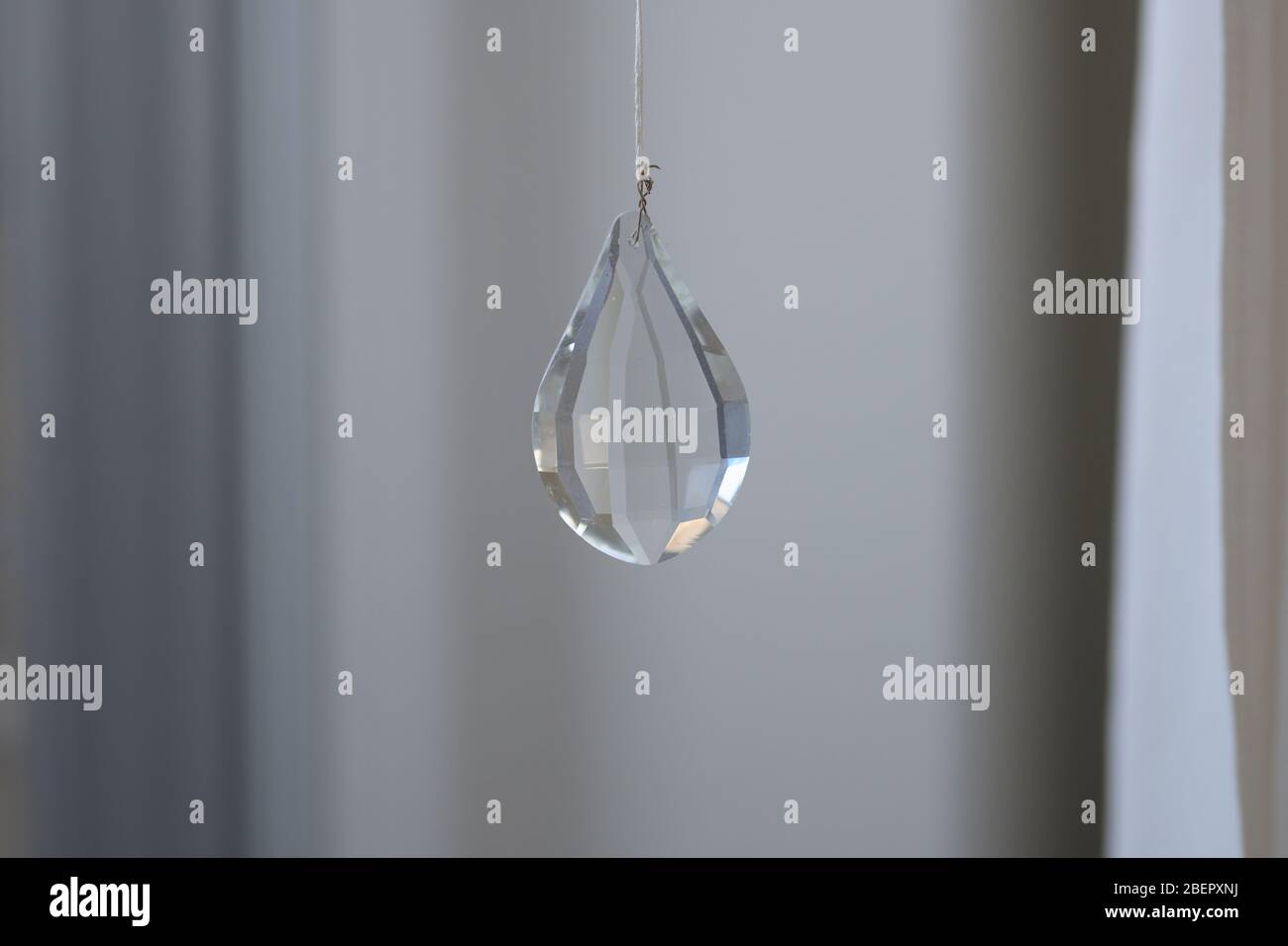 Glass string hanging hi-res stock photography and images - Alamy