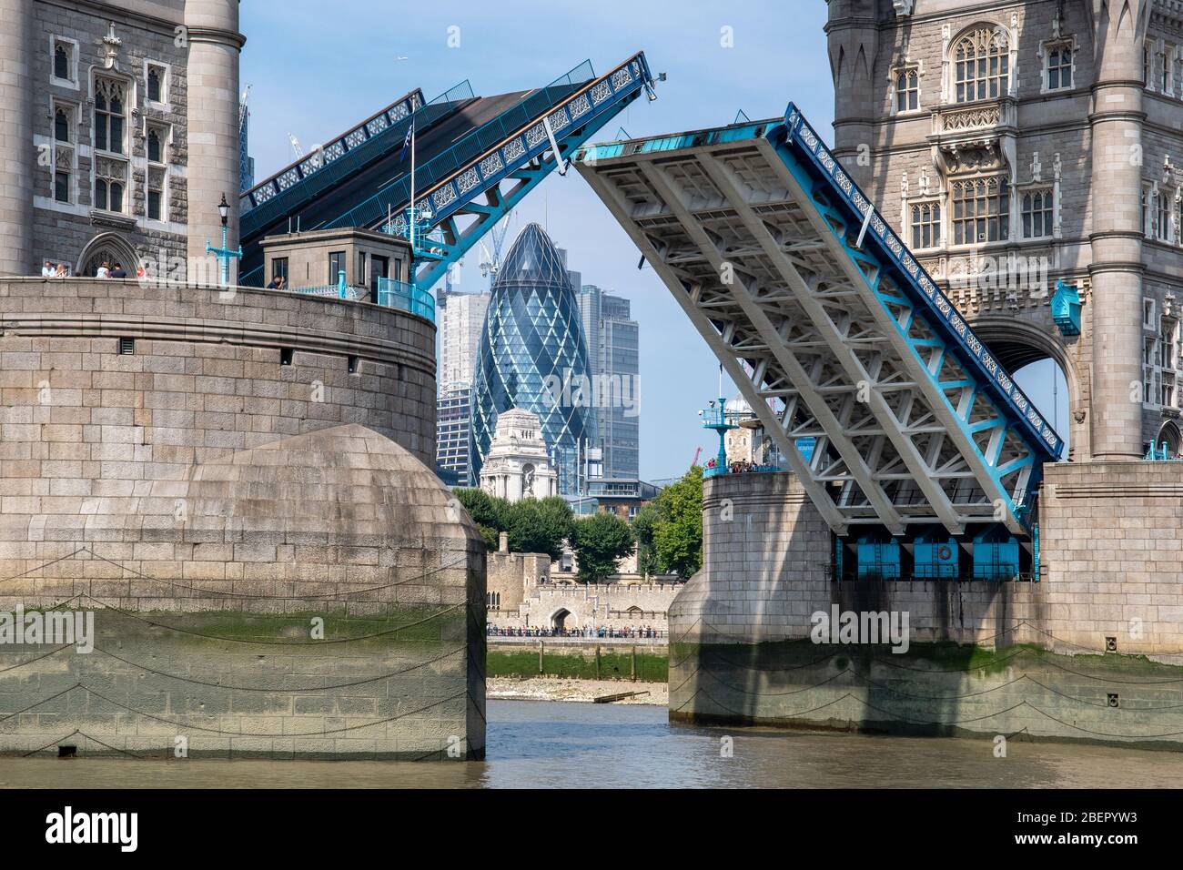 Tower Bridge opening for a cruie boat Stock Photo - Alamy