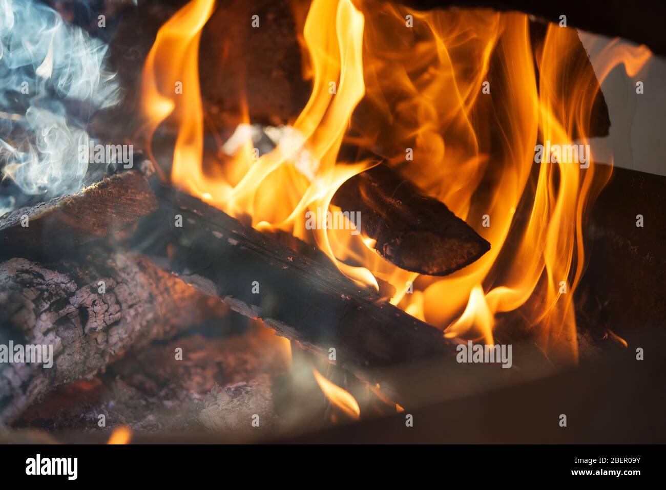 wooden bonfire for bbq as background. camping bonfire Stock Photo - Alamy