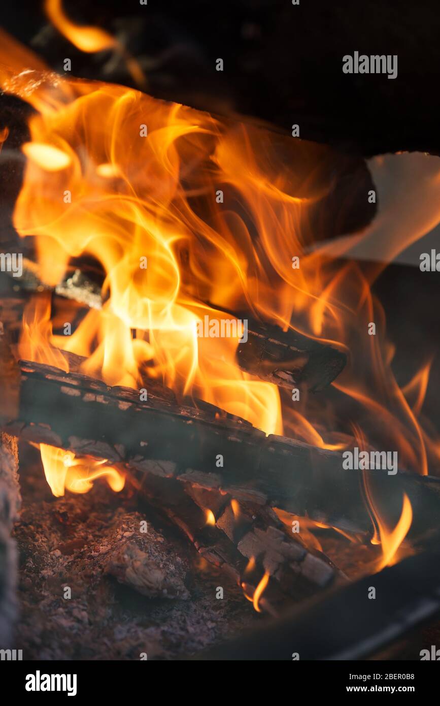 wooden bonfire for bbq as background. camping bonfire Stock Photo - Alamy