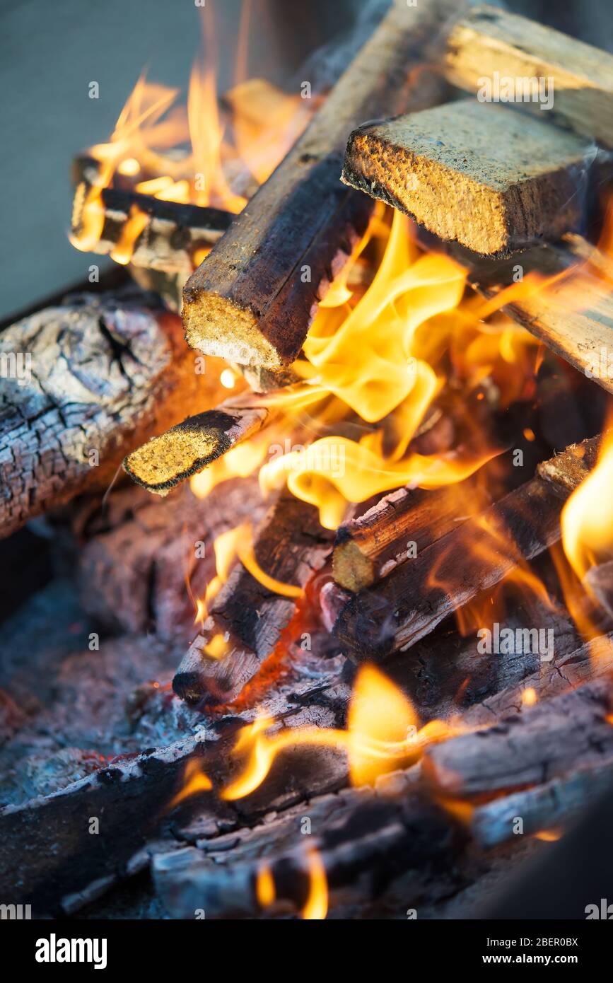 wooden bonfire for bbq as background. camping bonfire Stock Photo - Alamy