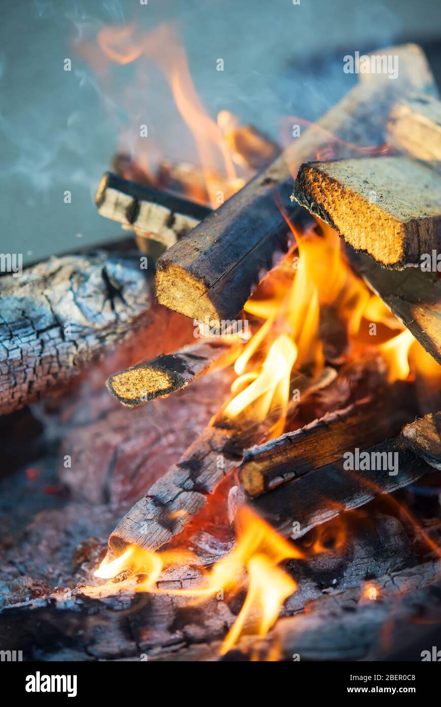 wooden bonfire for bbq as background. camping bonfire Stock Photo - Alamy