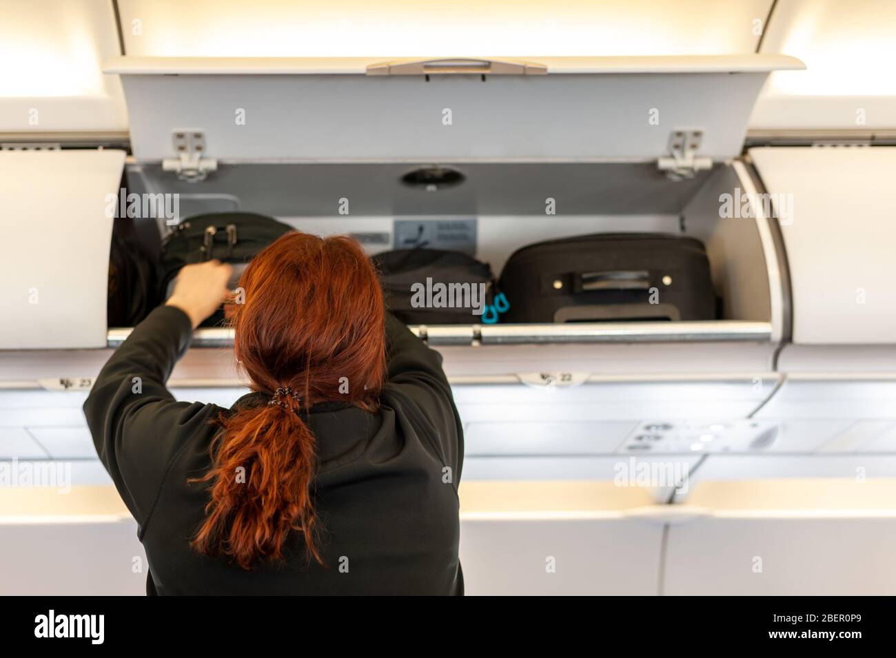 Luggage and overhead locker hi-res stock photography and images - Alamy