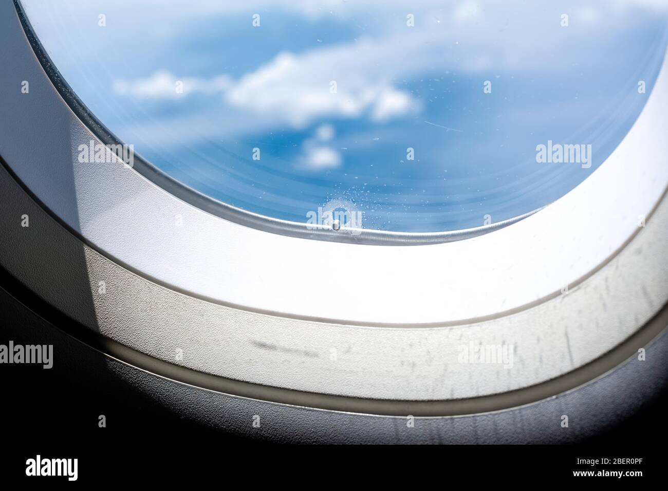 Tiny hole or bleed hole in airplane window compensate for difference ...