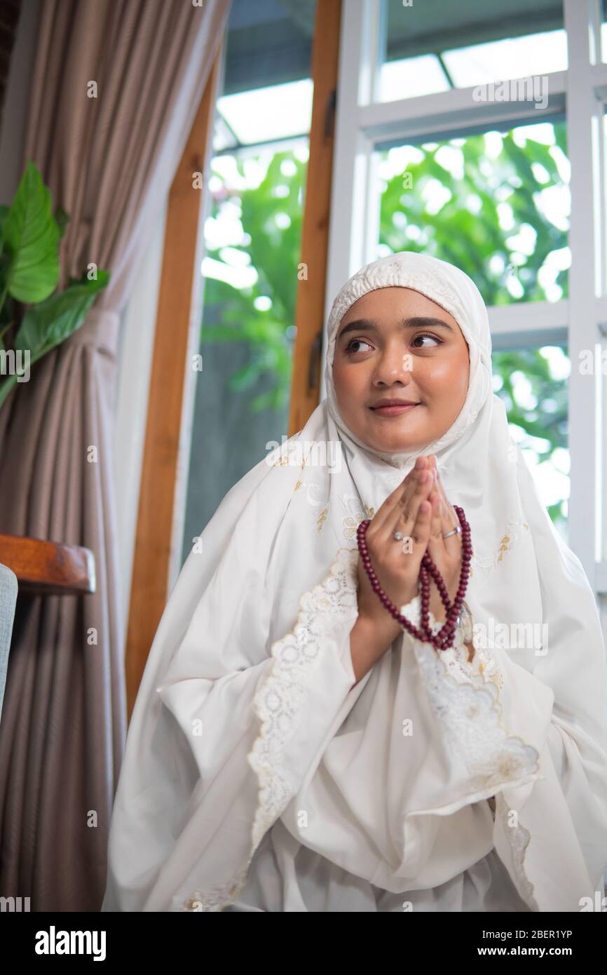 beautiful asian muslim woman praying. islam prayer Stock Photo - Alamy