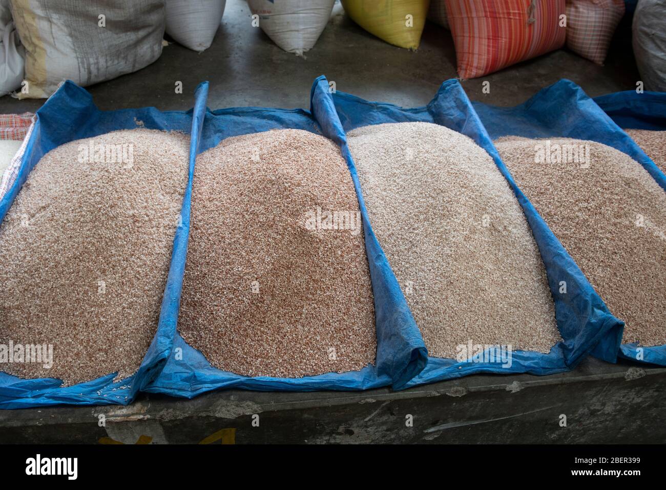 Bhutan, Thimphu. Local Farmer's Market. Detail of rice vendor display ...