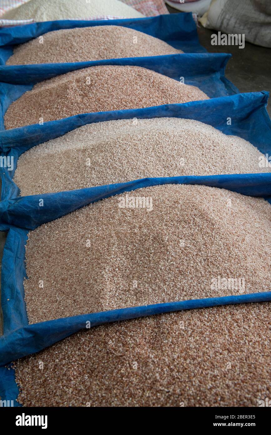 Bhutan, Thimphu. Local Farmer's Market. Detail of rice vendor display ...