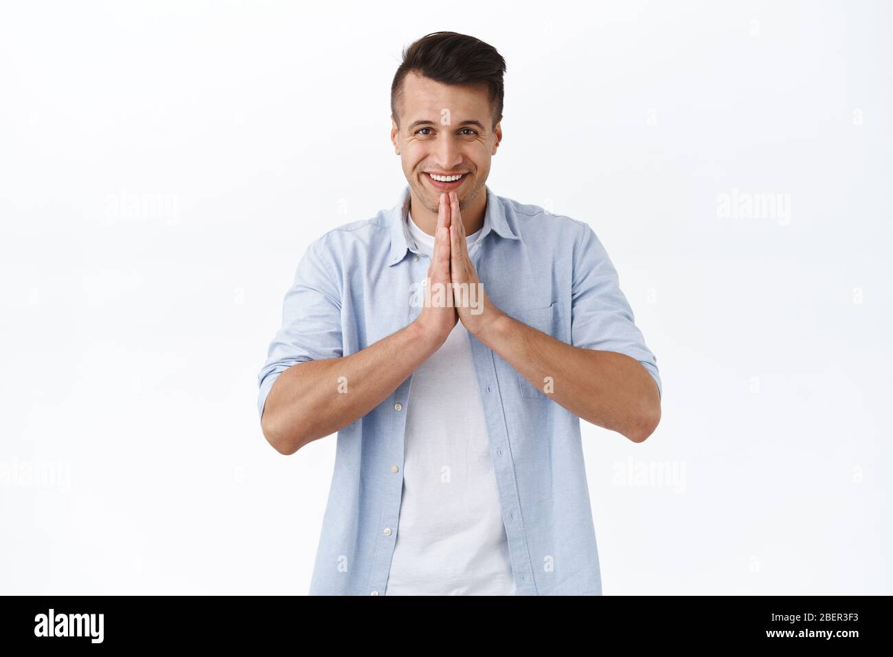 Portrait of happy smiling handsome man appreciate friends help, press ...