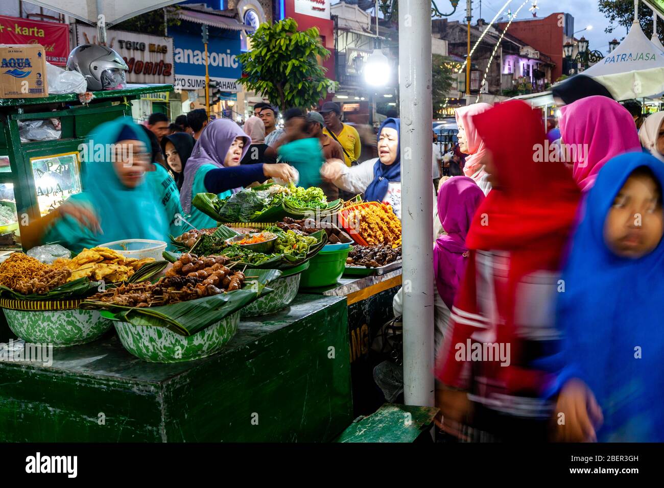 A Colourful Street Food Stall In The Night Market, Malioboro Street ...