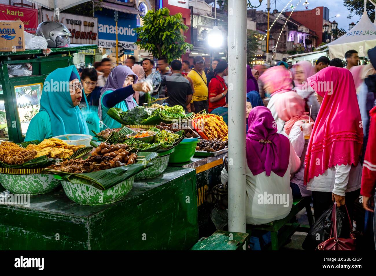 A Colourful Street Food Stall In The Night Market, Malioboro Street ...