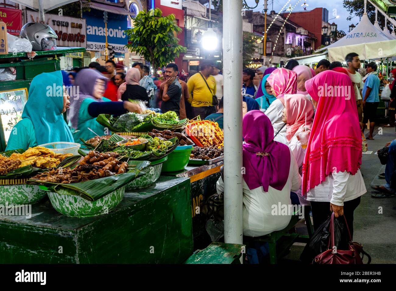 A Colourful Street Food Stall In The Night Market, Malioboro Street ...