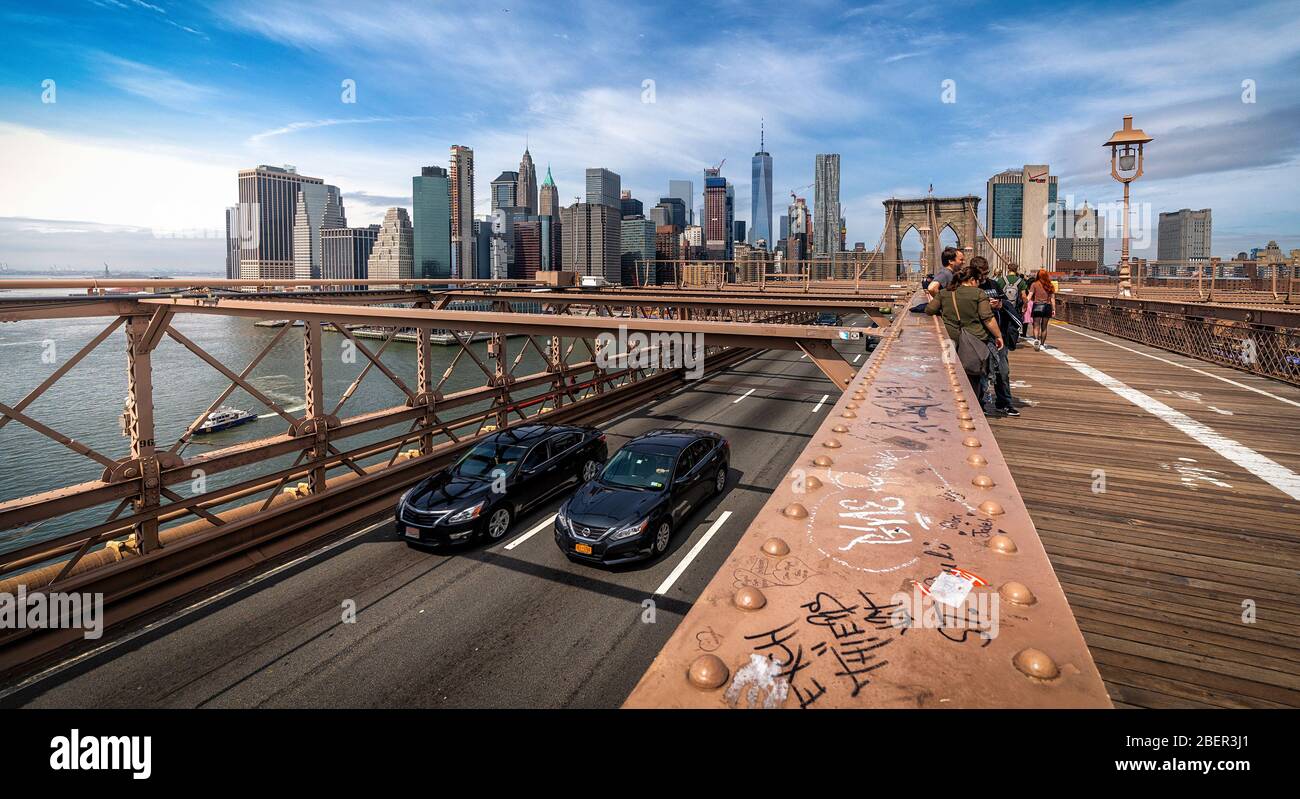 On Brooklyn bridge showing New York Skyline at broad daylight Stock ...