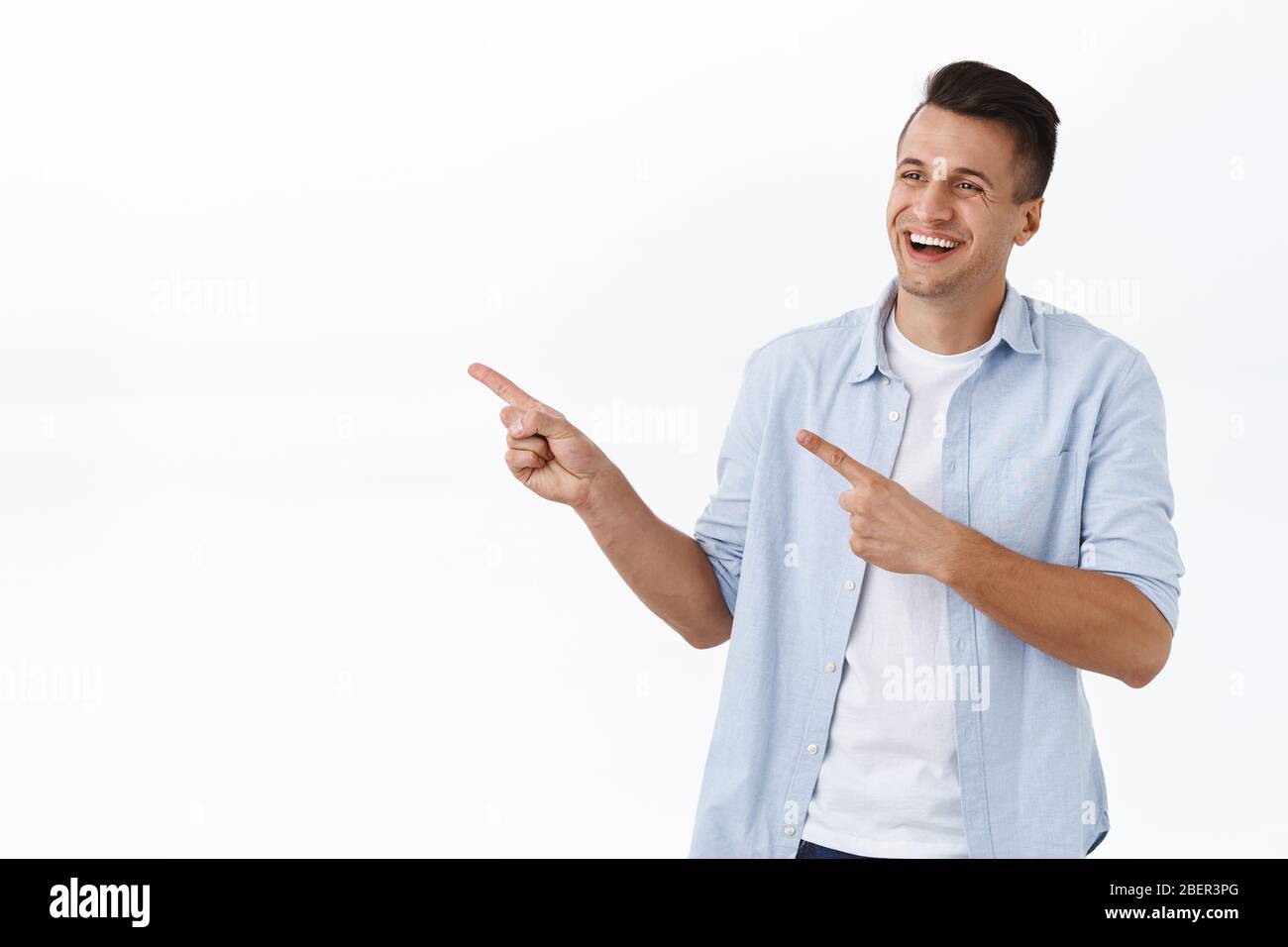 Portrait of handsome happy caucasian man with stylish haircut, laughing ...
