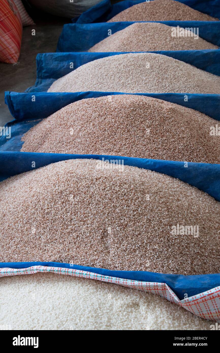 Bhutan, Thimphu. Local Farmer's Market. Detail of rice vendor display ...