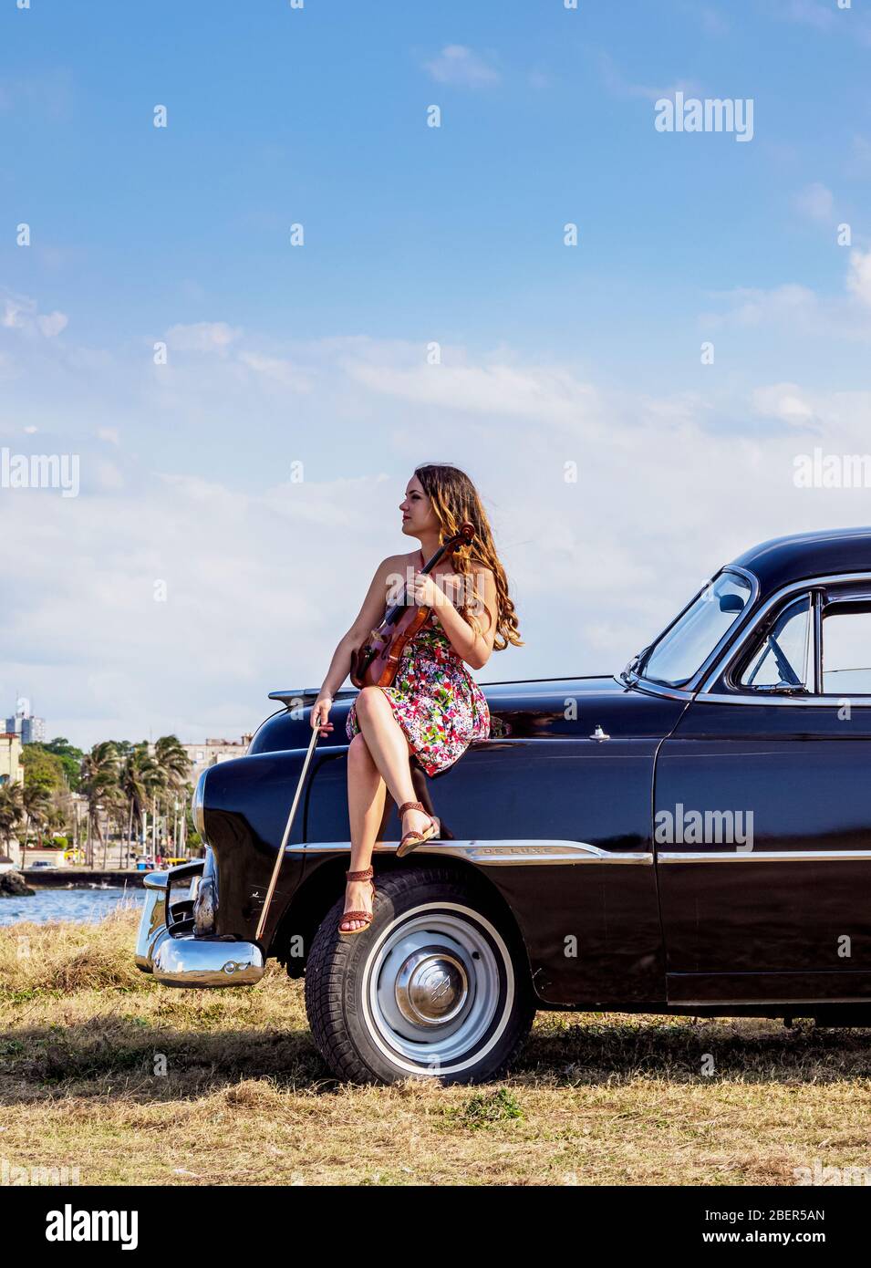 Cuban Violinist at Vintage Chevrolet Car, Havana, La Habana Province ...