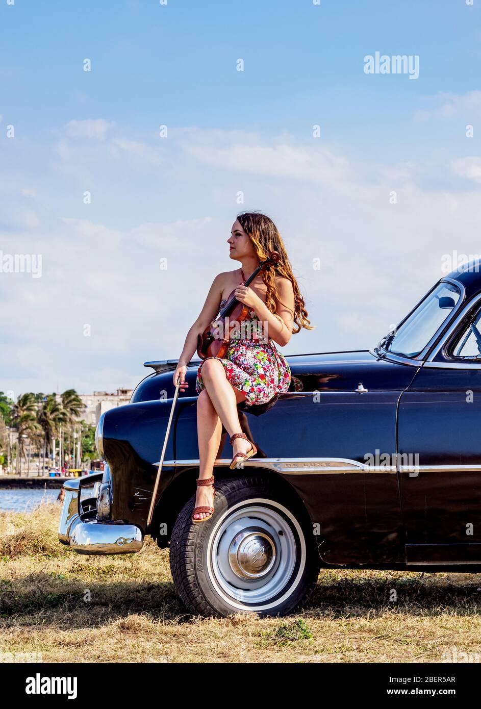 Cuban Violinist at Vintage Chevrolet Car, Havana, La Habana Province ...