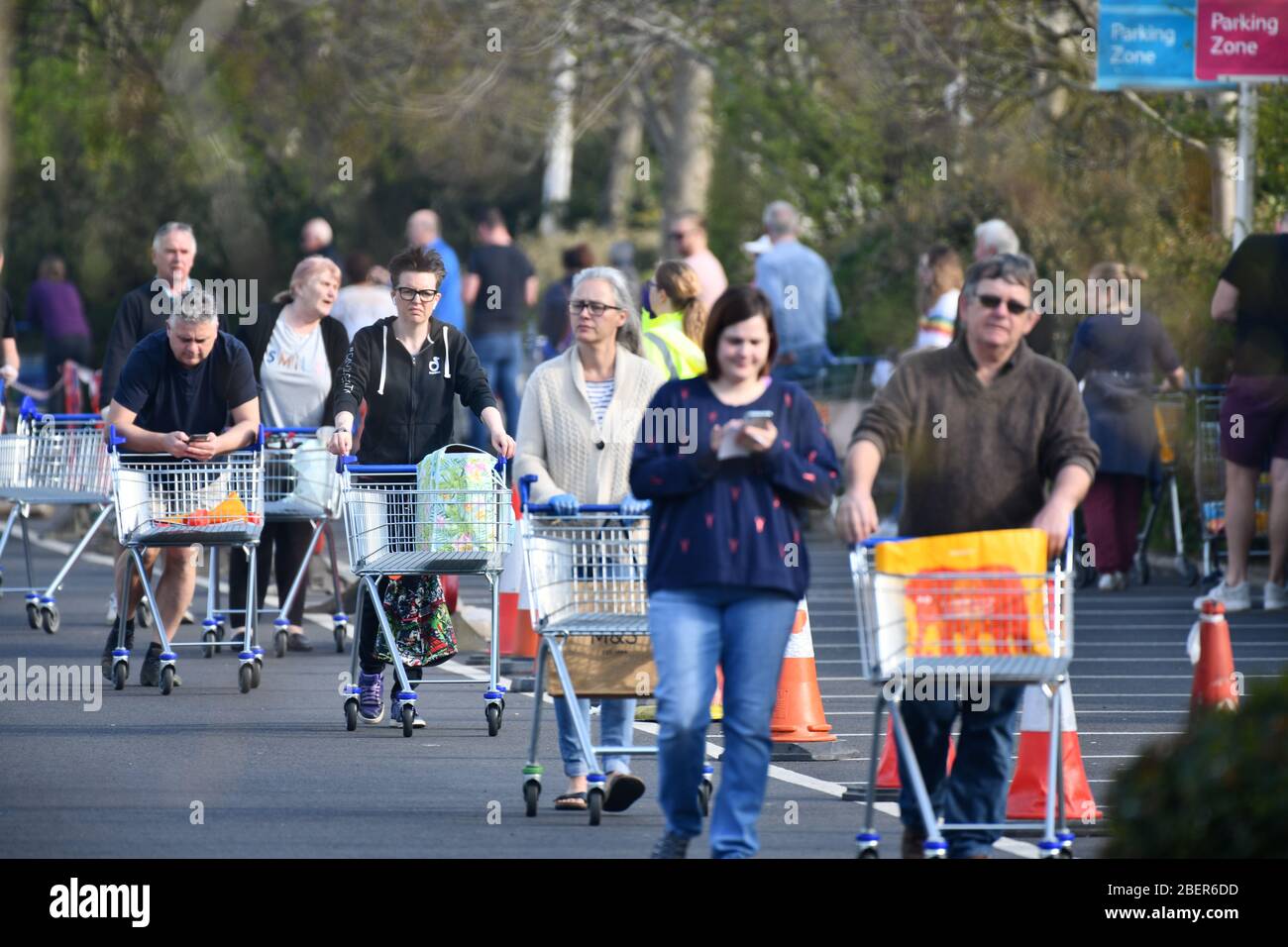 Covid19 in the UK requires food shoppers to maintain 2 meter distance ...