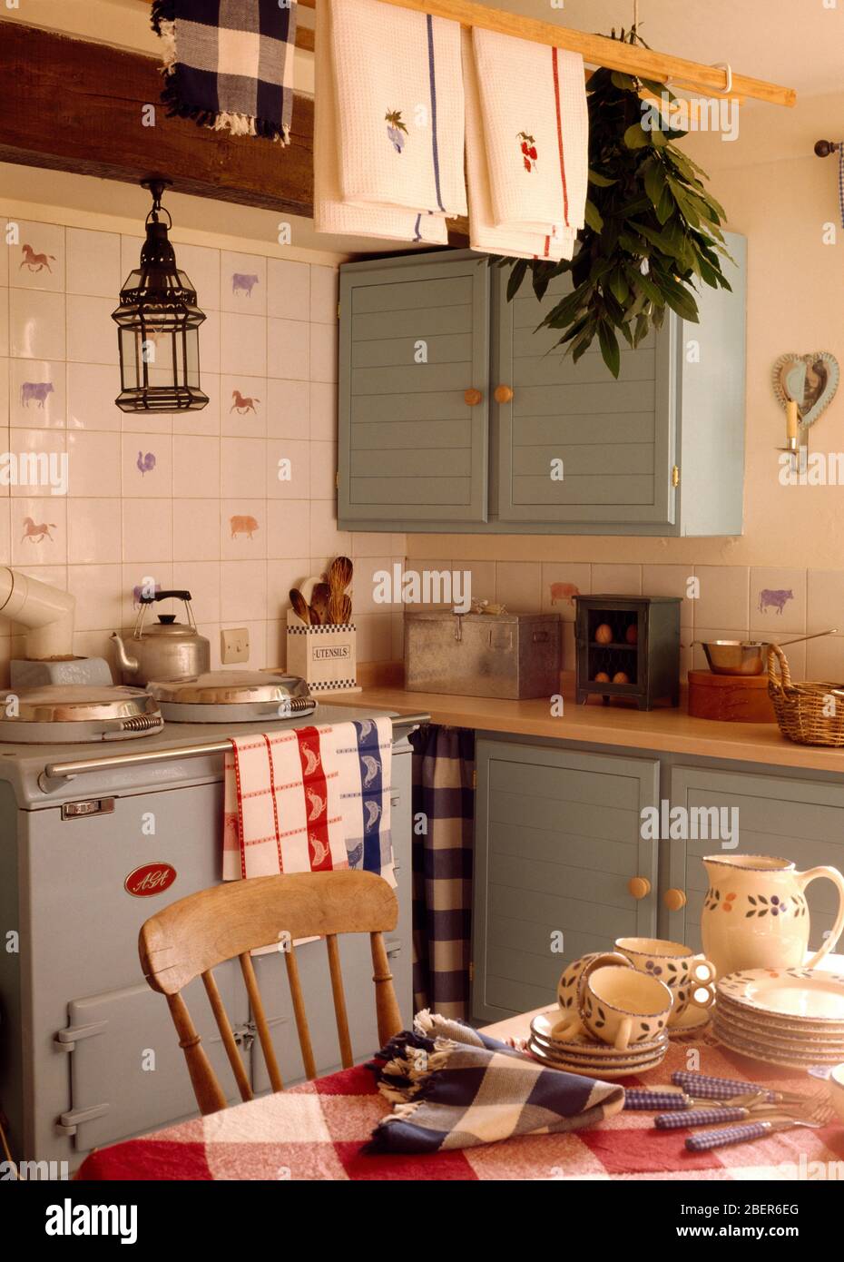 Small kitchen in family home Stock Photo - Alamy