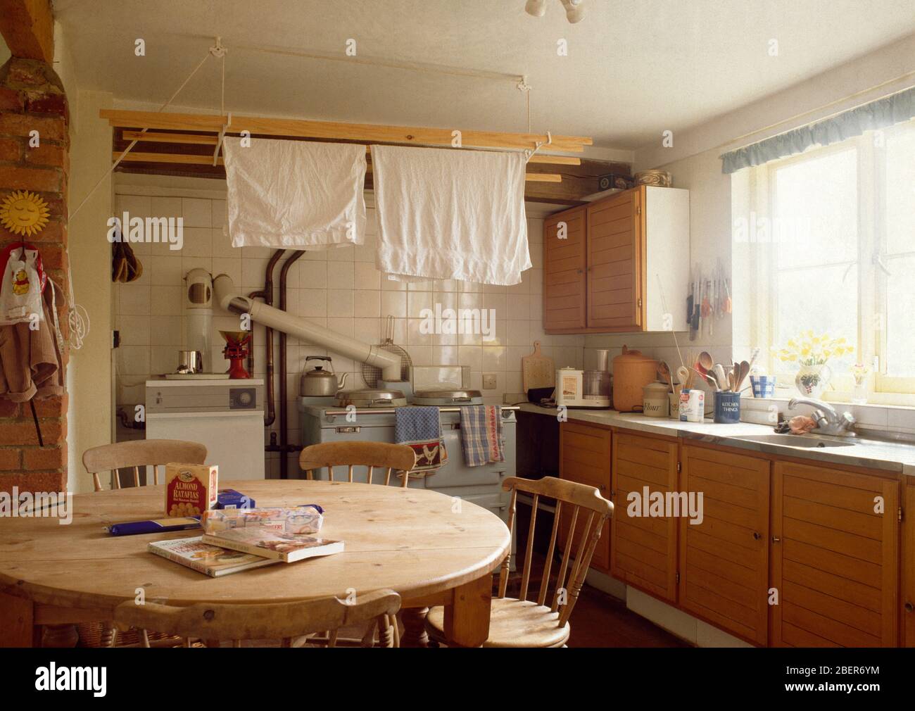 Old fashioned family kitchen in country Stock Photo - Alamy