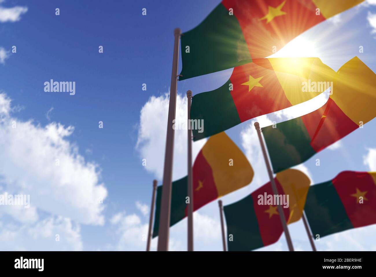 Cameroon flags waving in the wind against a blue sky. 3D Rendering ...