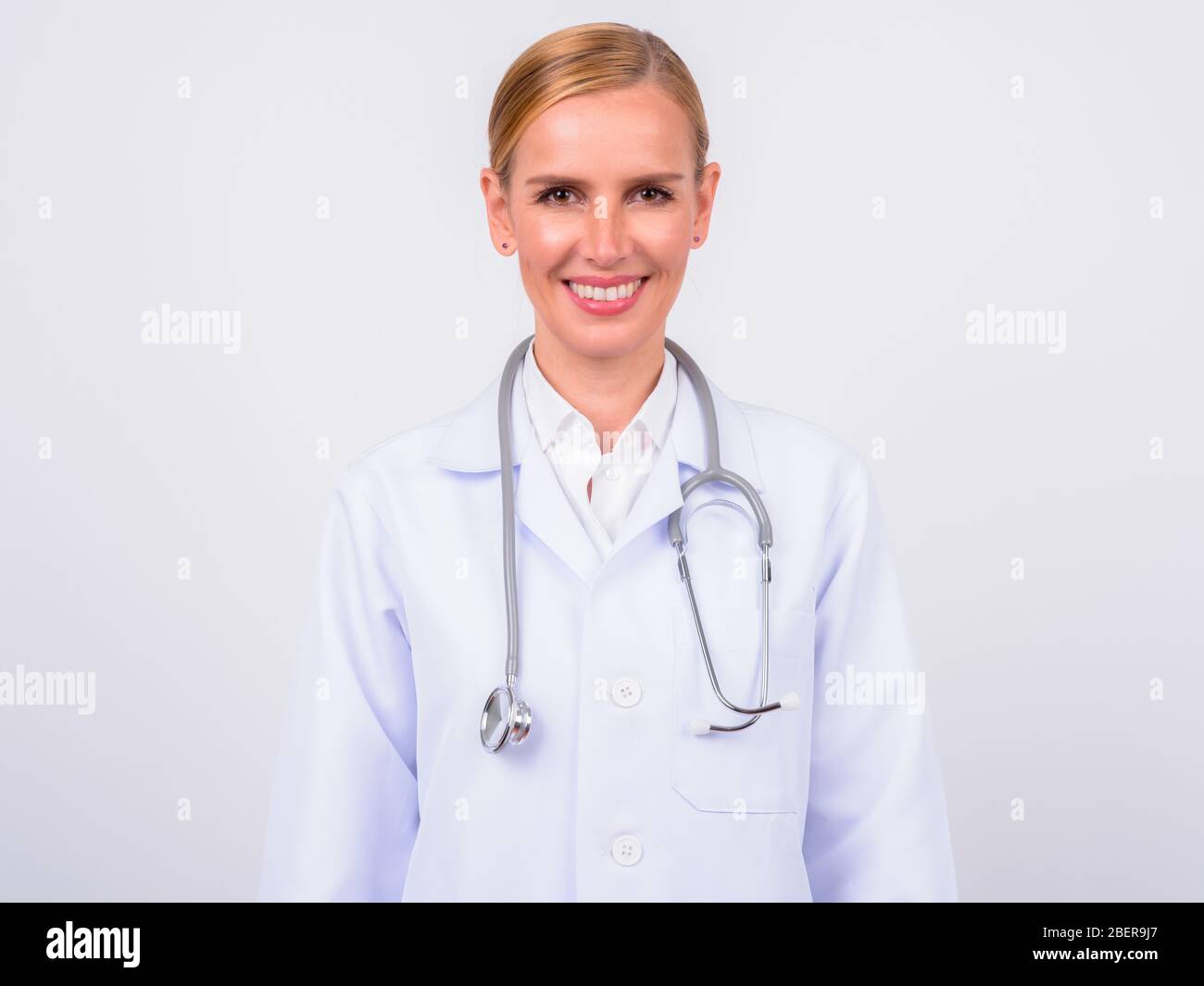 Portrait of happy blonde woman doctor smiling Stock Photo - Alamy